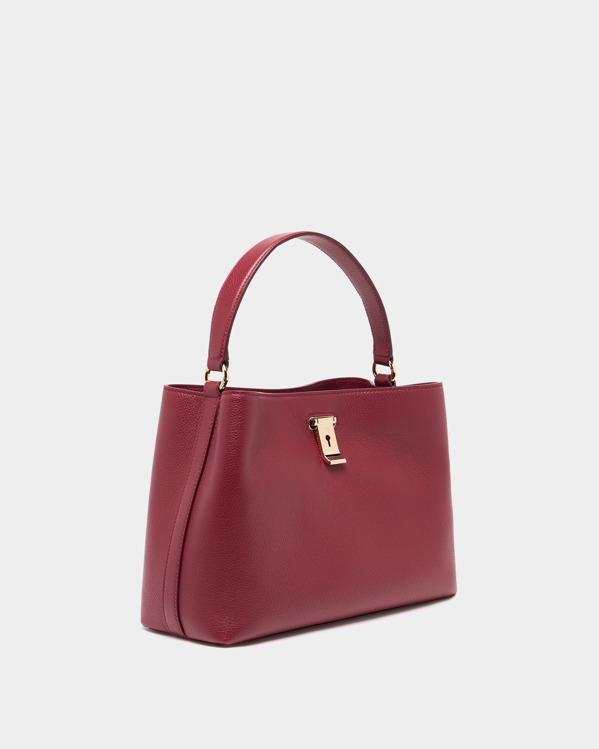 Women's Burgundy Lock Me Top Handle Bag in Burgundy Leather | Bally Global