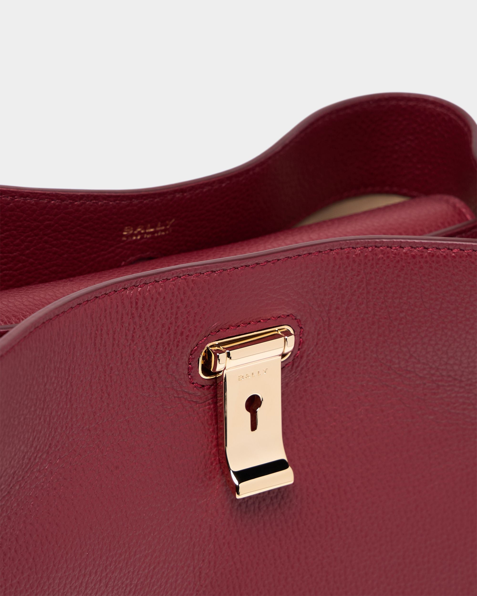 Women's Burgundy Lock Me Top Handle Bag in Burgundy Leather | Bally Global